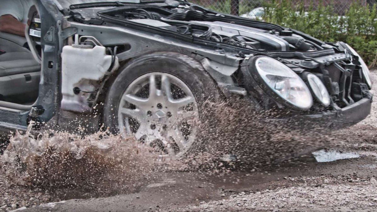 Watch this Mercedes E-Class taking a beating in slo-mo